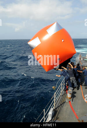 US Navy Sailors launch a Killer Tomato target from the littoral combat ...