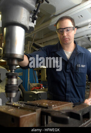 US Navy Machinery Repairman Fireman Apprentice fabricates a replacement ...