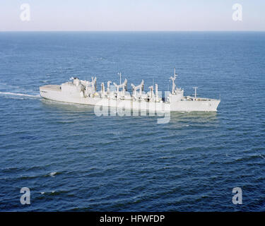 A starboard bow view of the replenishment oiler USS WABASH (AOR 5) (center) conducting an ...