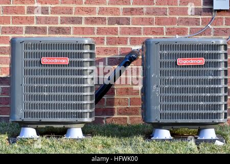 Goodman air conditioning units outside a residential home Stock Photo ...