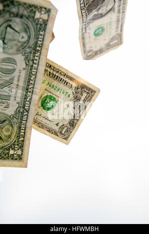 Falling dollars bank notes isolated Stock Photo - Alamy