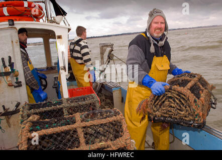 Crab fishing in Dorset with Les Lawrence (yellow wader) with fellow ...