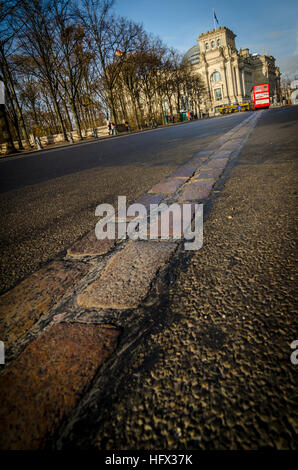 Historic route of the Berlin Wall Berliner Mauer marked by a sign on ...