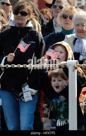 US Navy Family members welcome home their sailors stationed aboard the ...