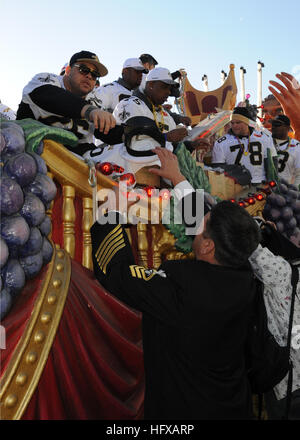 New Orleans Saints football players riding a float in the Saints ...