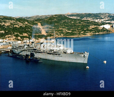 A starboard bow view of the submarine tender USS CANOPUS (AS-34) tied ...