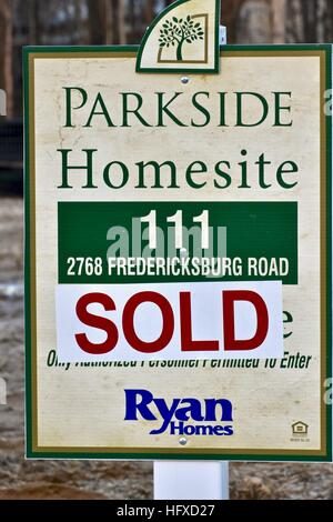 A sold sign on a new home site by the Ryan homes builders Stock Photo ...