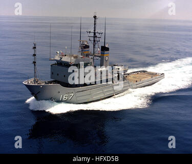 A port bow view of the fleet tug USNS NAVAJO (T-ATF-169) tied up to the ...