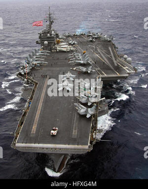 USS Kitty Hawk conducts flight operations in the Philippine Sea ...