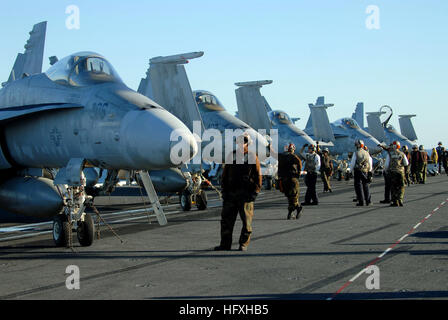 Plane captains conduct pre-flight checks on an MH-53E Sea Dragon ...