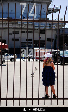 Family members wait to greet the crew of the USCGC Legare (WMEC 912 ...