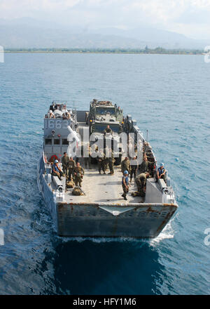 Landing craft loaded with U.S. Marines heads for the seawall at Inchon ...