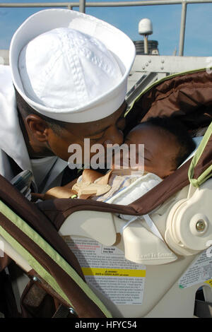 US Navy U.S. Navy Career Counselor 1st Class helps construct a wheel ...
