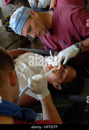 Medical staff aboard USS Iwo Jima (LHD 7) conduct pre-screening exams ...