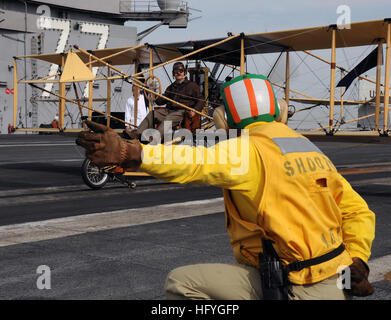 US Navy A shooter signals to the pilot Stock Photo - Alamy