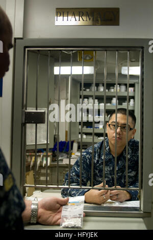 Hospital Corpsman aboard USS Carl Vinson (CVN 70) provides care and ...