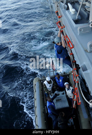 Boatswain’s Mate pilots a rigid-hull inflatable boat from USS ...
