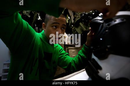 Airman Alan Cardinez, aircrew survival equipmentman, assigned to Strike ...