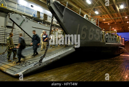 A Landing Craft Utility returns to the well deck of USS Belleau Wood ...