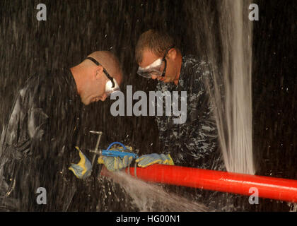 clamp down a pipe, damage control competition, Naval Base San Diego ...