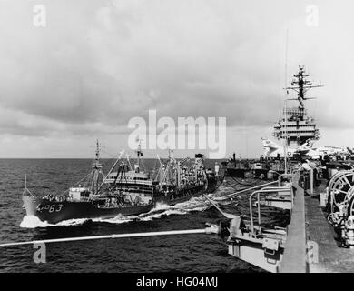 USS Chipola (AO-63) alongside USS Constellation (CVA-64) in March 1964 ...