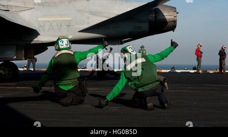 US Navy Final checkers give the clear to launch signal prior to ...