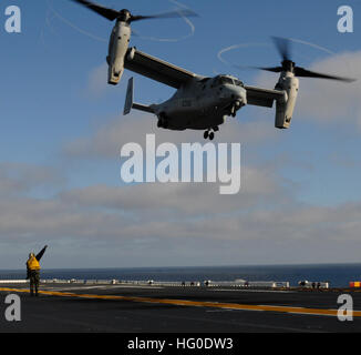 An MV-22 Osprey launched from the flight deck of JS Hyuga (DDH 181) in ...