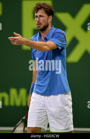 Doha, Qatar. 2nd Jan, 2017. Dustin Brown of Germany returns a shot to ...