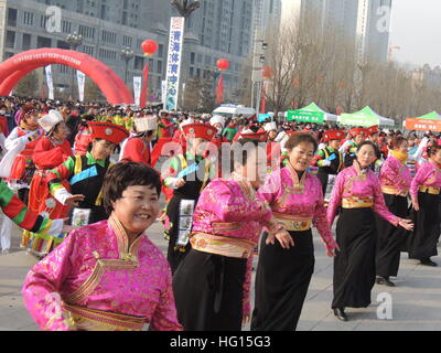 Xining, China's Qinghai Province. 4th Nov, 2018. Staff workers clean up ...