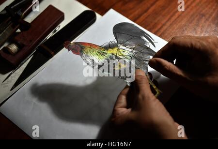 Tianjin, China. 4th Jan, 2017. Wei Guoqiu, the 4th generation of Kite ...