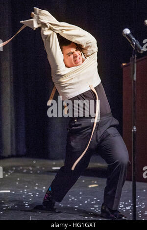 A formally dressed magician at a Huntington Beach, CA, theater magician ...