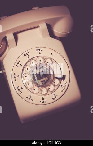 Black vintage landline telephone, old and weathered. Broken ...