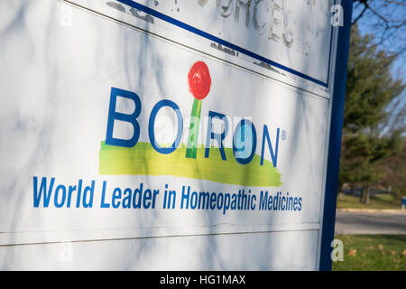 A logo sign outside of a facility occupied by SoftwareONE in Munich ...