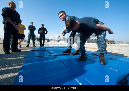 U.S. Navy Master-at-Arms 1st Class Sergio Altamirano, assigned to the ...
