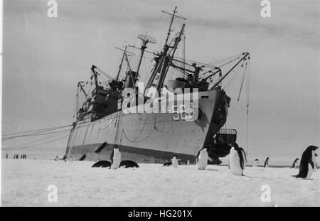 USS Arneb (AKA-56) being repaired in Antarctica 1957 Stock Photo - Alamy