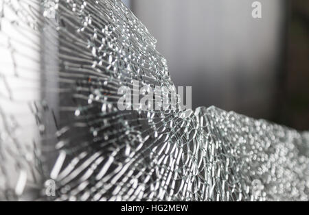 Broken window glass on a background of blue sky Stock Photo - Alamy