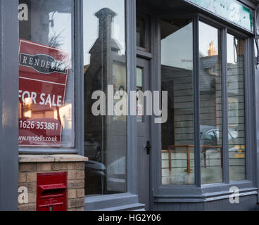Closed and closing shops and Post Office in a small Devon town Stock ...