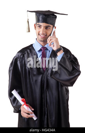 Portrait Of University Graduate Using Mobile Stock Photo - Alamy