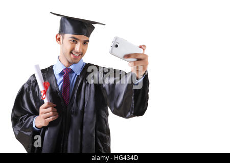 Portrait Of University Graduate Using Mobile Stock Photo - Alamy