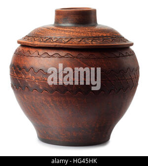 one old clay pot for cooking with closed cap isolated on white Stock ...