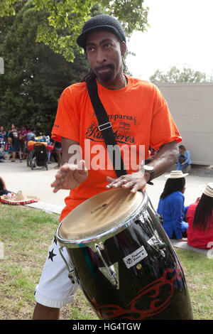 Afro-Caribbean conga drummer (tumbadora player) - USA Stock Photo - Alamy