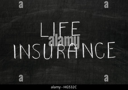 Life insurance message handwritten on the blackboard Stock Photo - Alamy