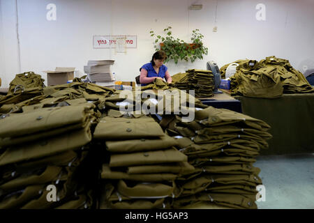 Israeli women sewing military uniforms for the IDF Israeli army in ...