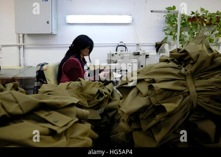 Israeli women sewing military uniforms for the IDF Israeli army in ...