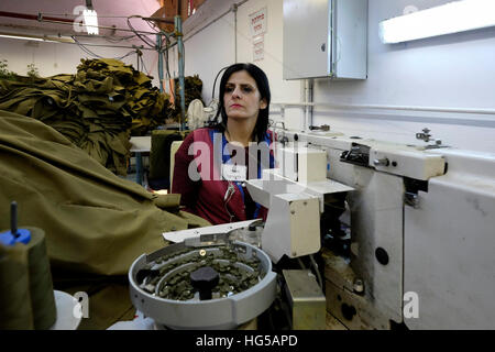 Israeli women sewing military uniforms for the IDF Israeli army in ...