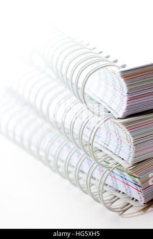 Spiral Notebooks in a stack on a white background Stock Photo - Alamy