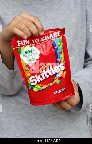 Australian Skittles in red pack isolated Stock Photo - Alamy