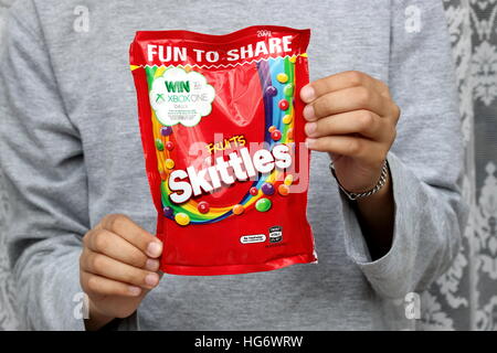 Skittles fruit-flavoured candies isolated on white background Stock ...