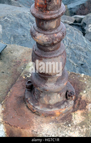 Damaged concrete pillar with rusty iron fittings Stock Photo - Alamy