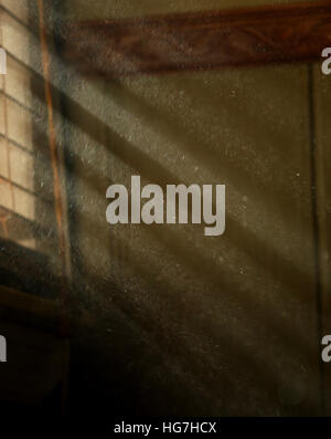 Dust in sunbeam through home window Stock Photo - Alamy